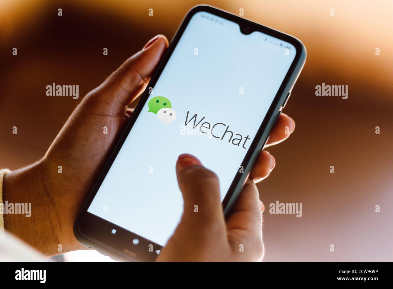In this photo illustration the WeChat logo seen displayed on a ...