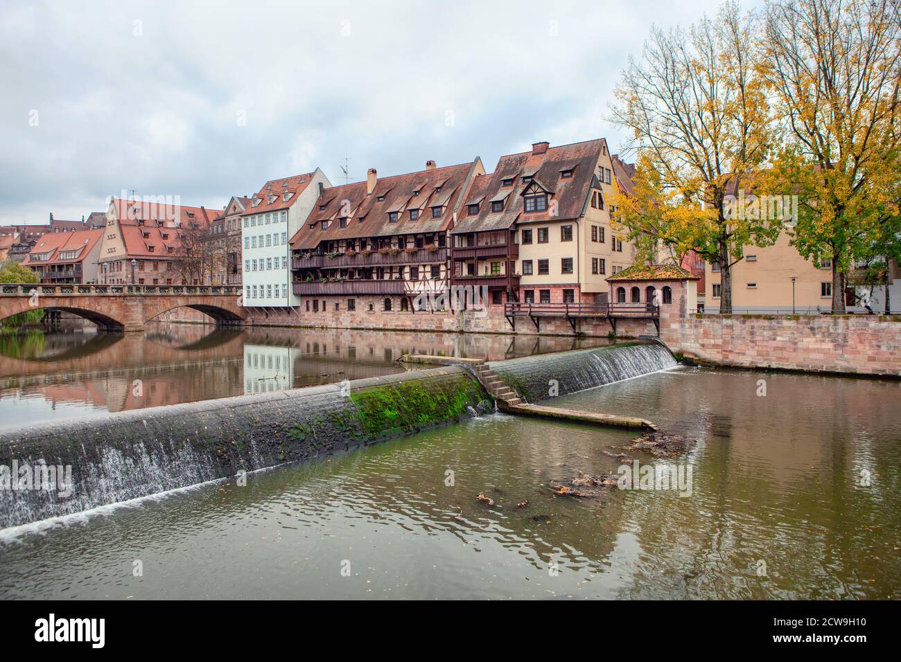 View of Pegnitz river and Maxbrucke in Nuremberg . Fast flowing with ...