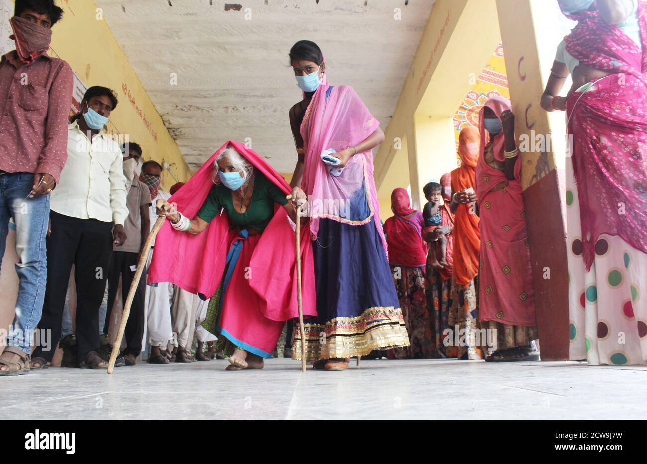 Sheoganj, India. 28th Sep, 2020. An elderly woman arrives to cast her ...