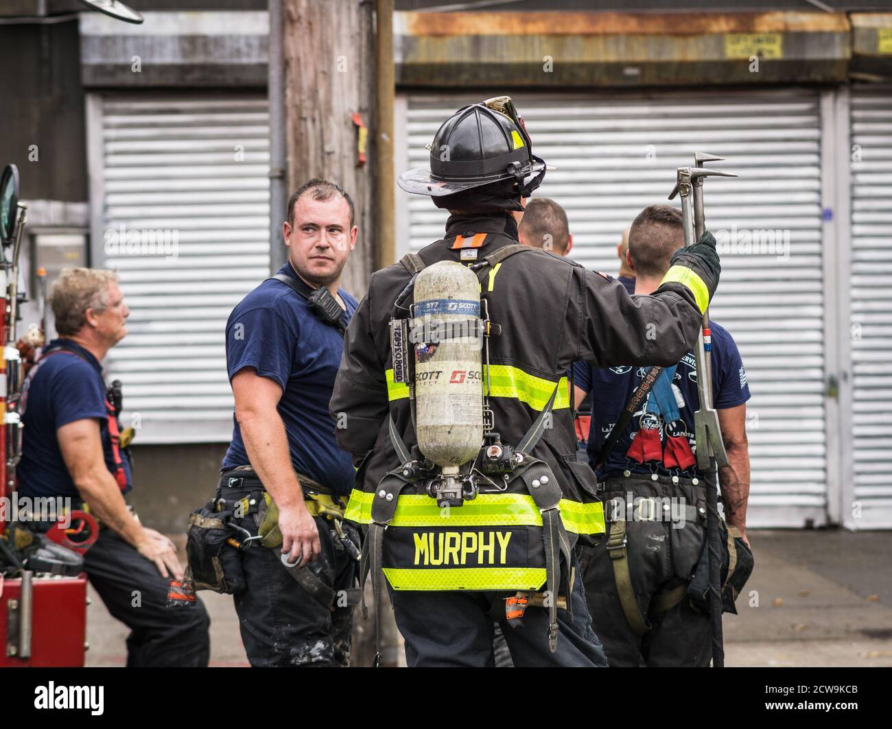 New York City Fire fighters rescue three children from a burning ...