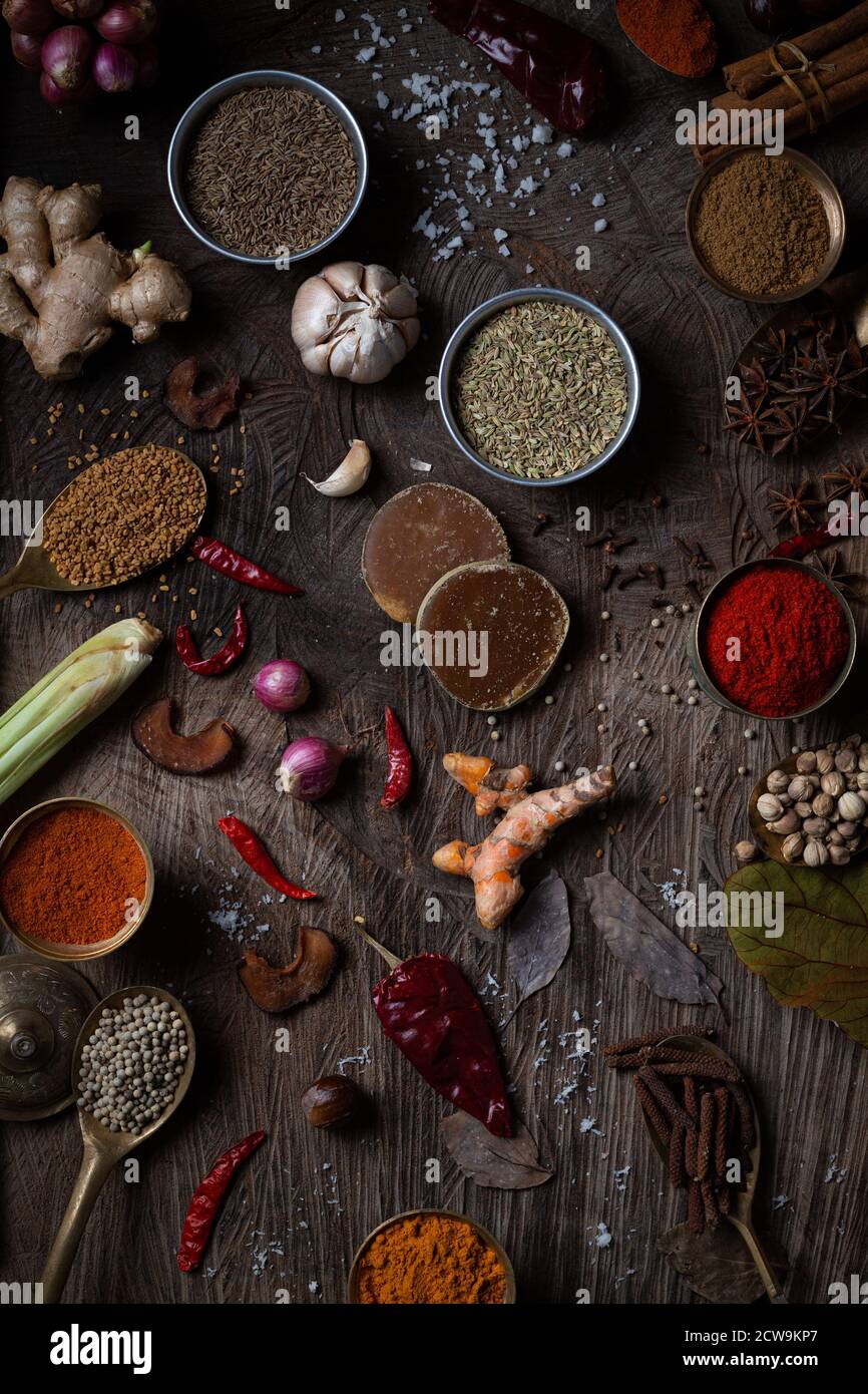 Condiment of indian food Spice garnish background on wood table top ...