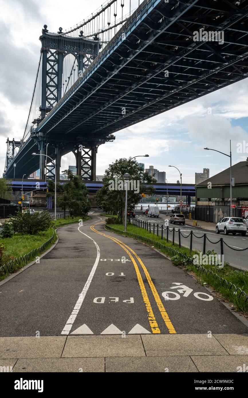Bicycle lane under the bridge Stock Photo - Alamy