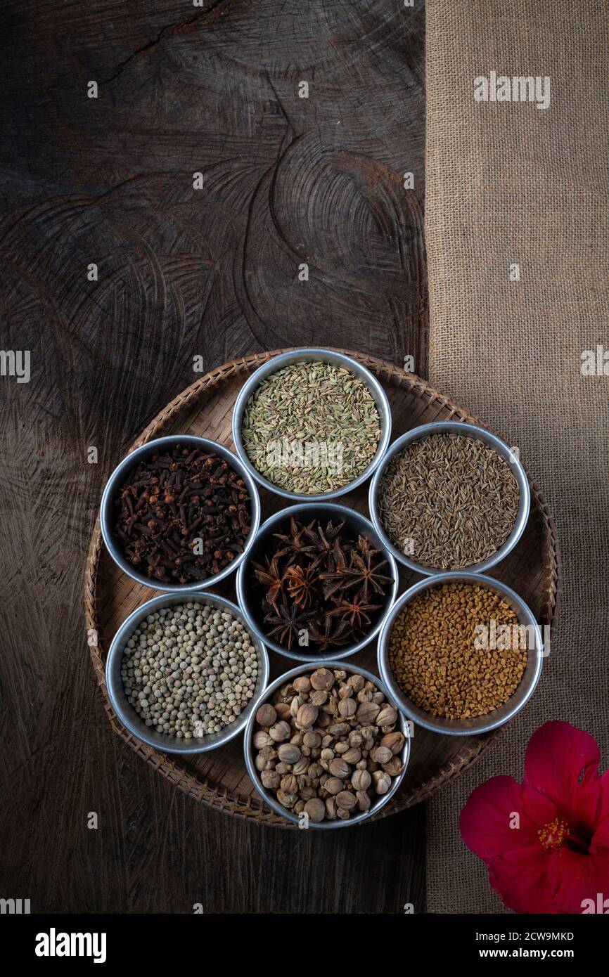 Condiment of indian food Spice garnish background on wood table top ...