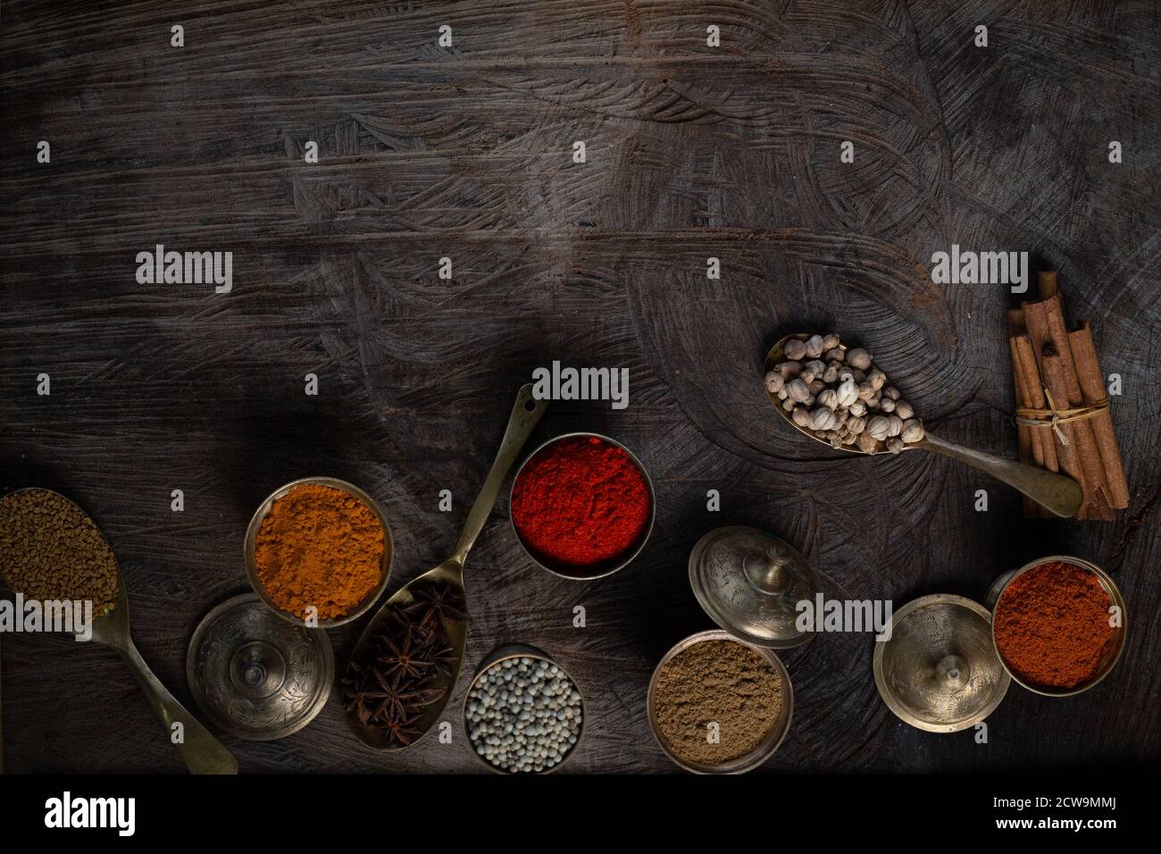 Condiment of indian food Spice garnish background on wood table top ...
