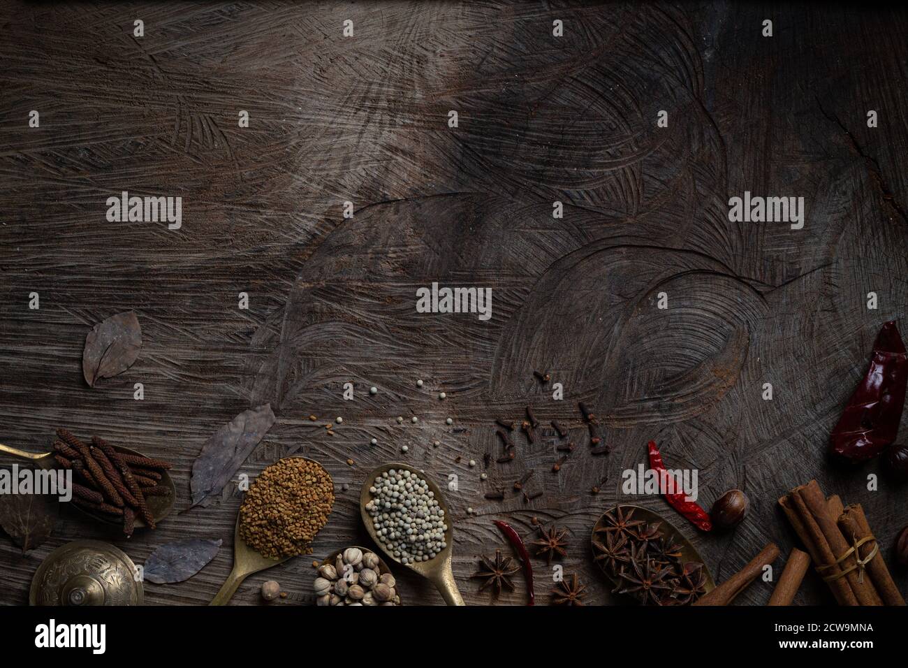 Condiment of indian food Spice garnish background on wood table top ...