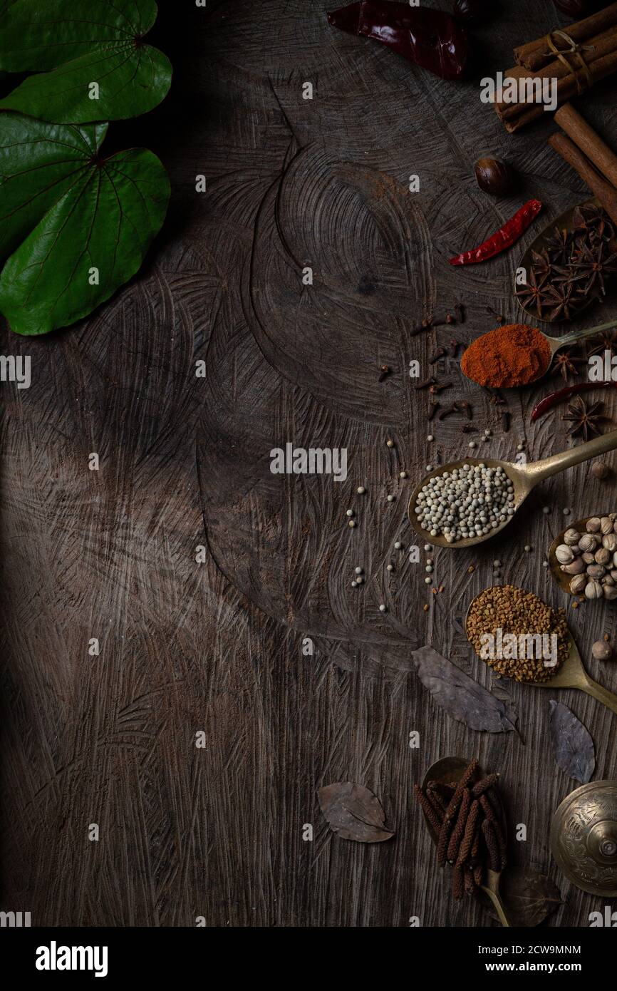 Condiment of indian food Spice garnish background on wood table top ...