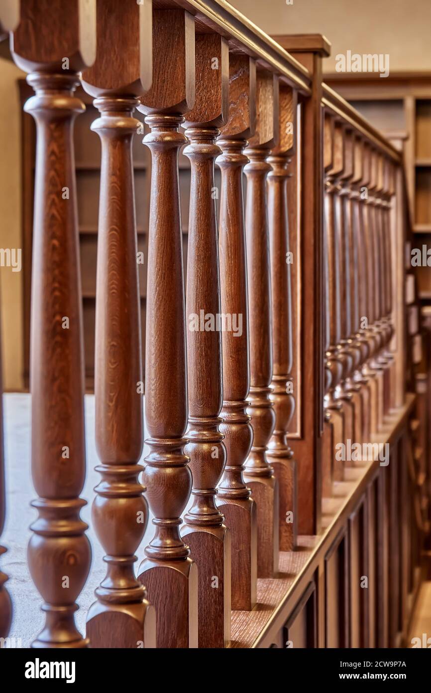 Perspective view of detail of ornate wooden railing in contemporary ...