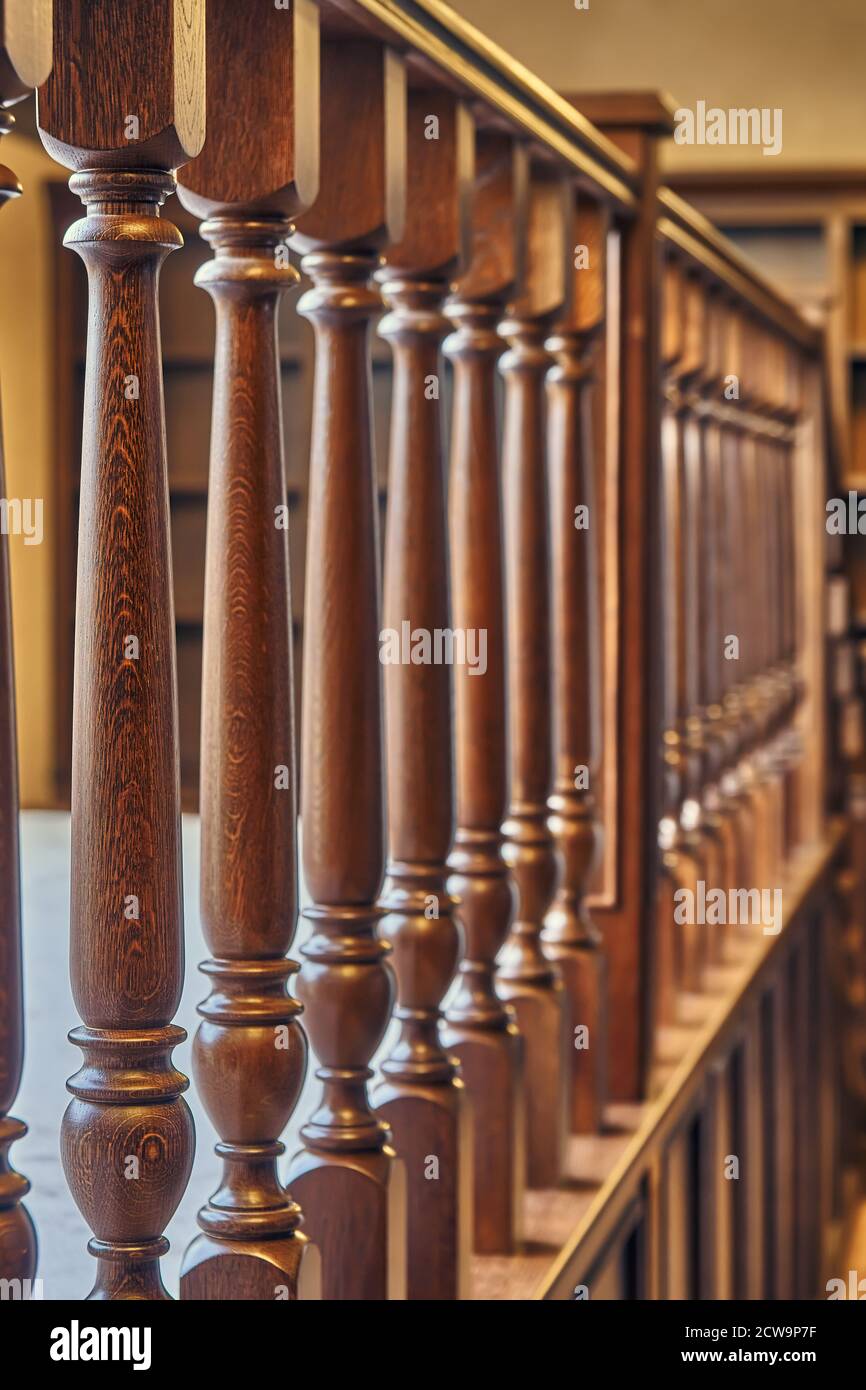Perspective view of detail of ornate wooden railing in contemporary ...