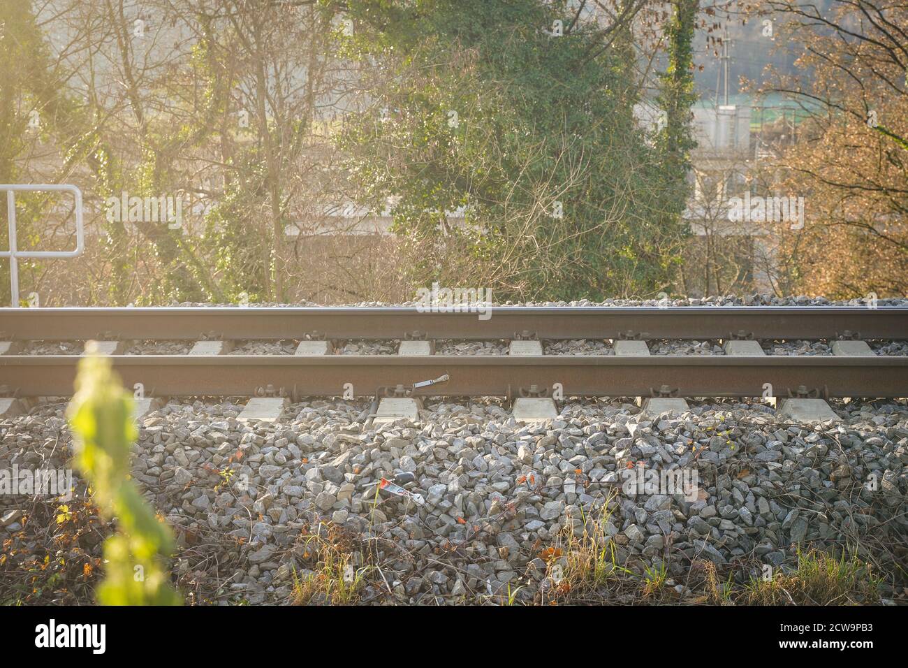 a train railway by the roadside Stock Photo - Alamy