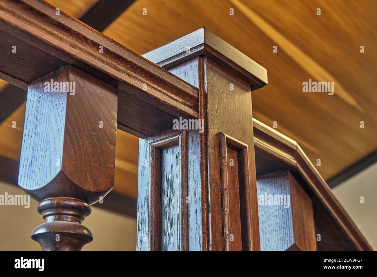 Stair pillar close-up. Wooden railing of classic staircase in ...