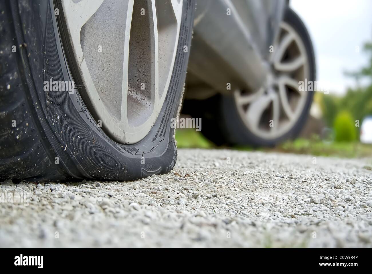 Spare tire on dirt road hi-res stock photography and images - Alamy