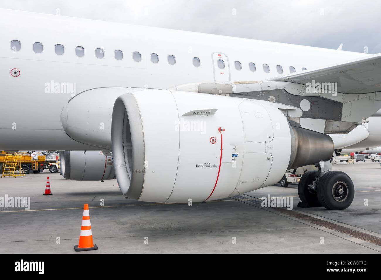 Aircraft engine, wing, landing gear and fuselage with portholes Stock ...
