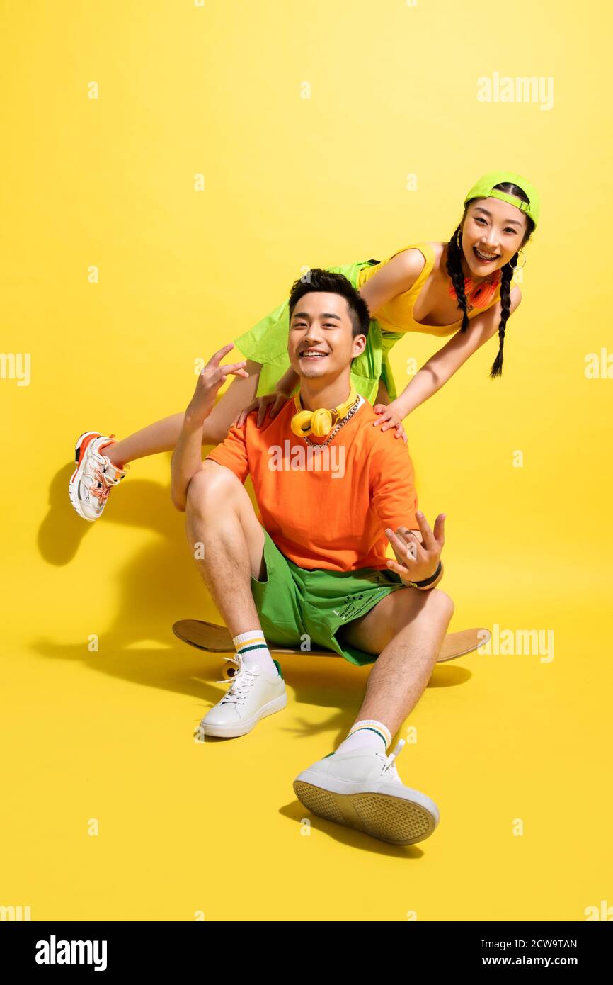 Sitting on skateboard play hi-res stock photography and images - Alamy