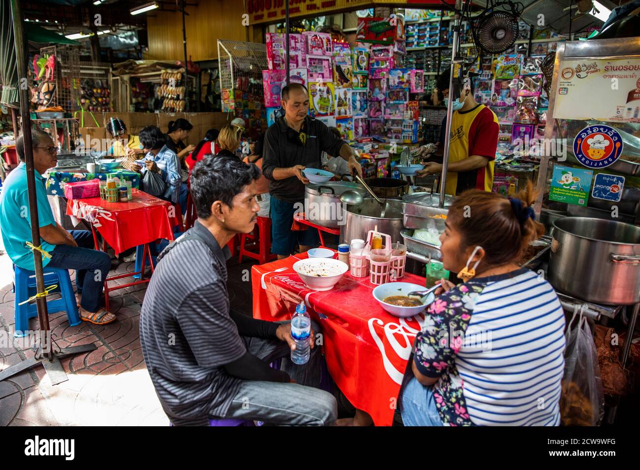 Customers eat or wait for food at this popular diner in Bangkok's ...