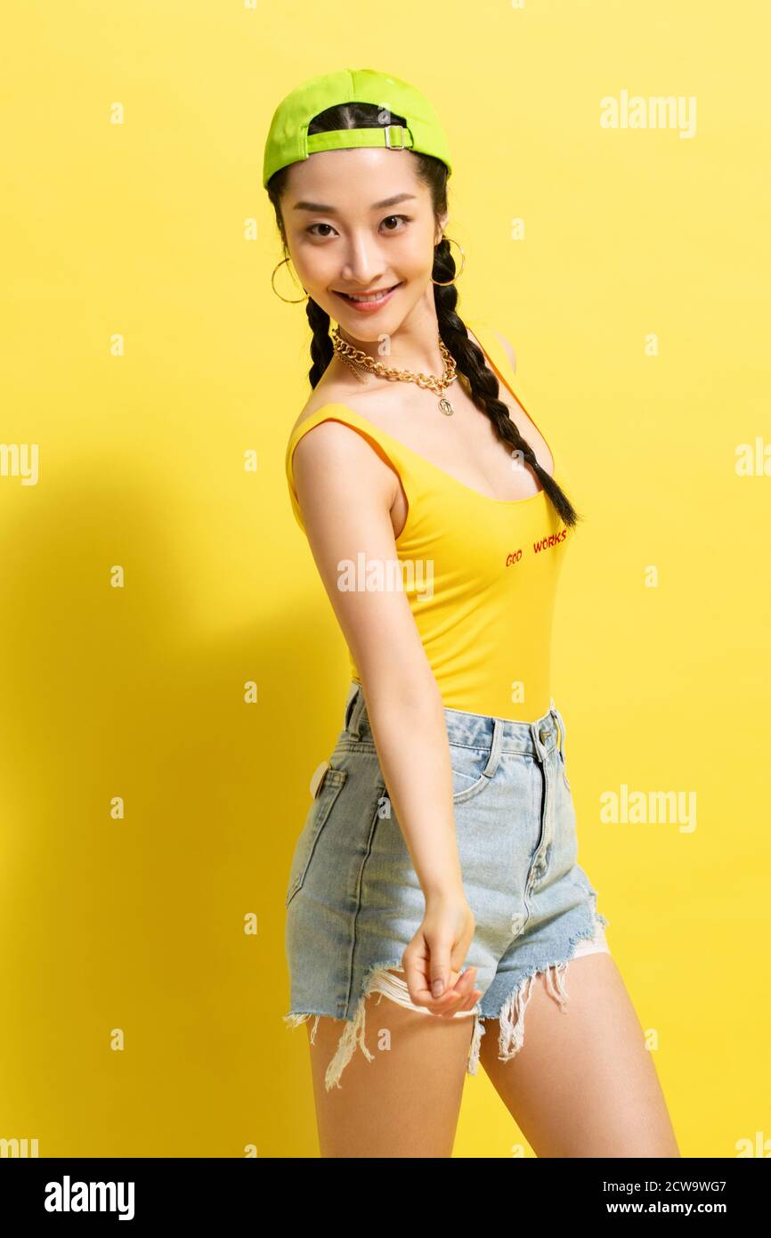Happy confident young girl Stock Photo - Alamy