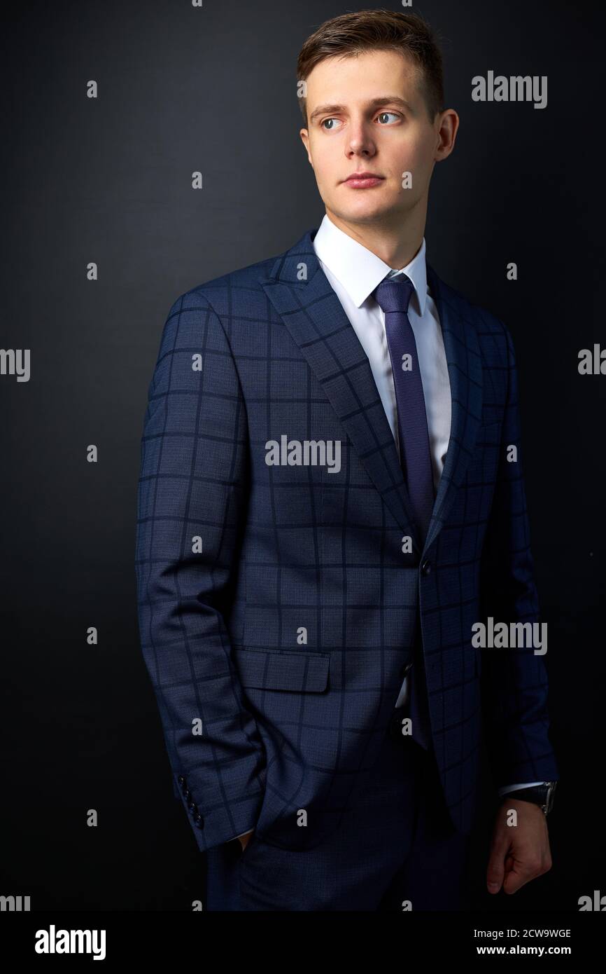 confident trendy caucasian guy in formal stylish suit posing isolated ...