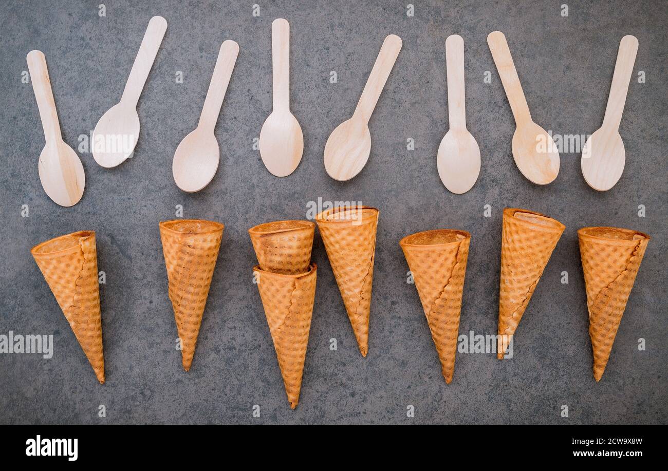 Flat lay ice cream cones collection on dark stone background . Blank ...