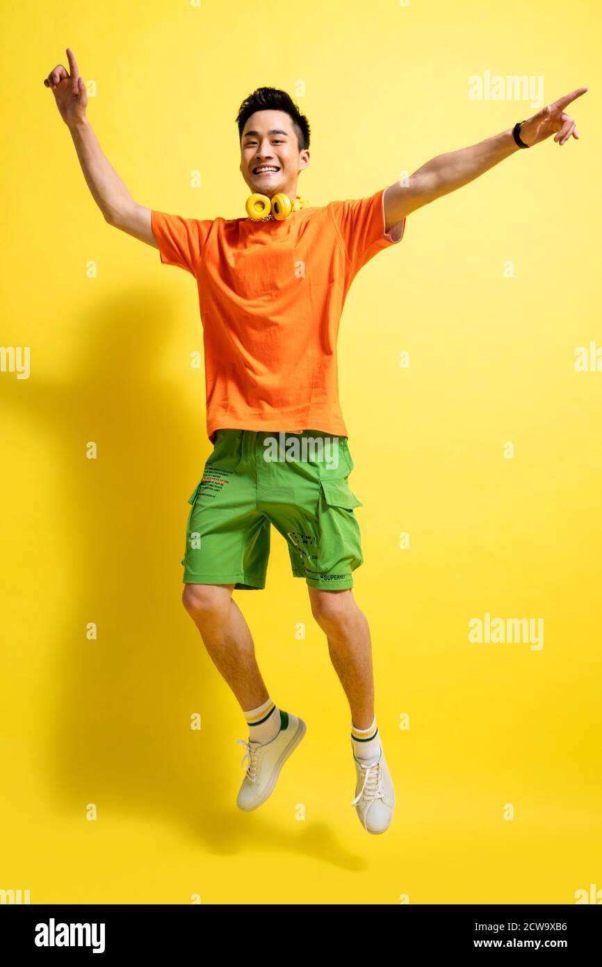 Energetic young man Stock Photo - Alamy