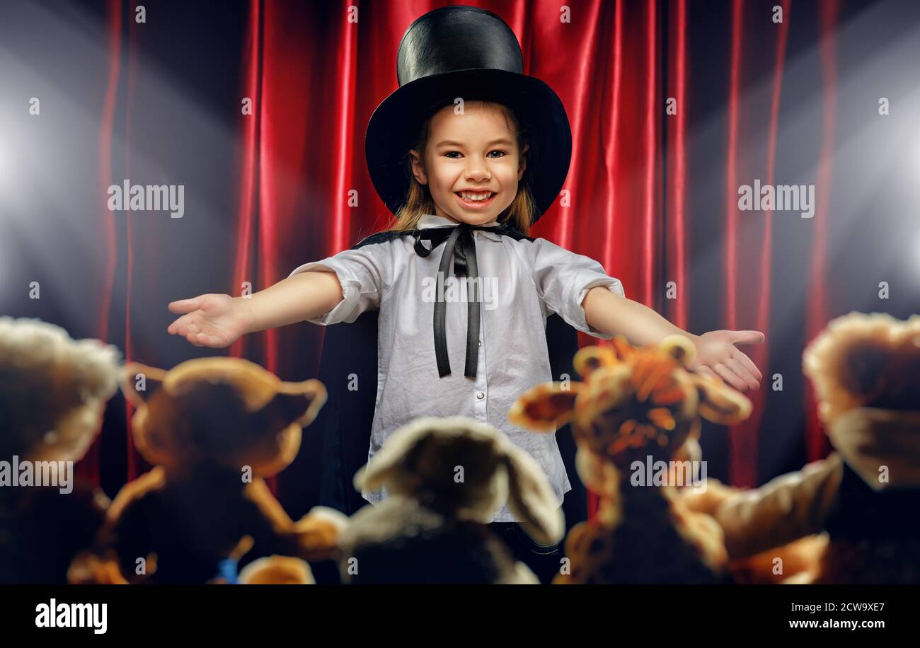 the little magician does tricks Stock Photo - Alamy