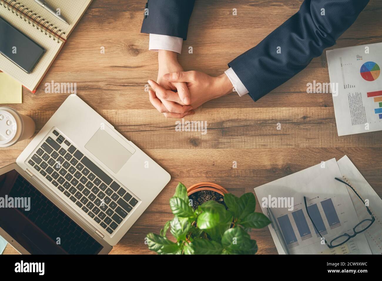 man sitting at his workplace in the office. top view close-up Stock ...