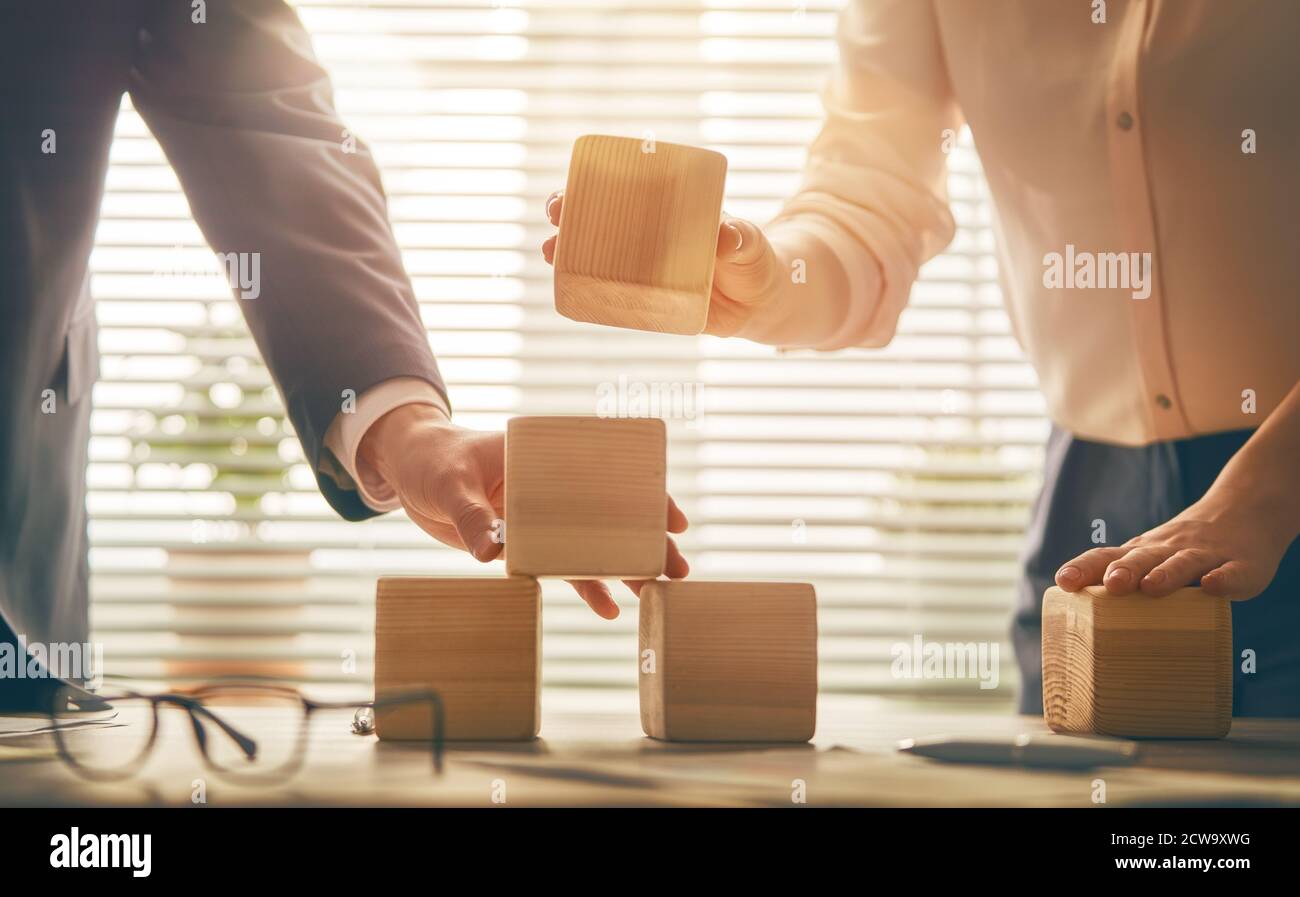 two business persons plan a project. team work in office Stock Photo ...