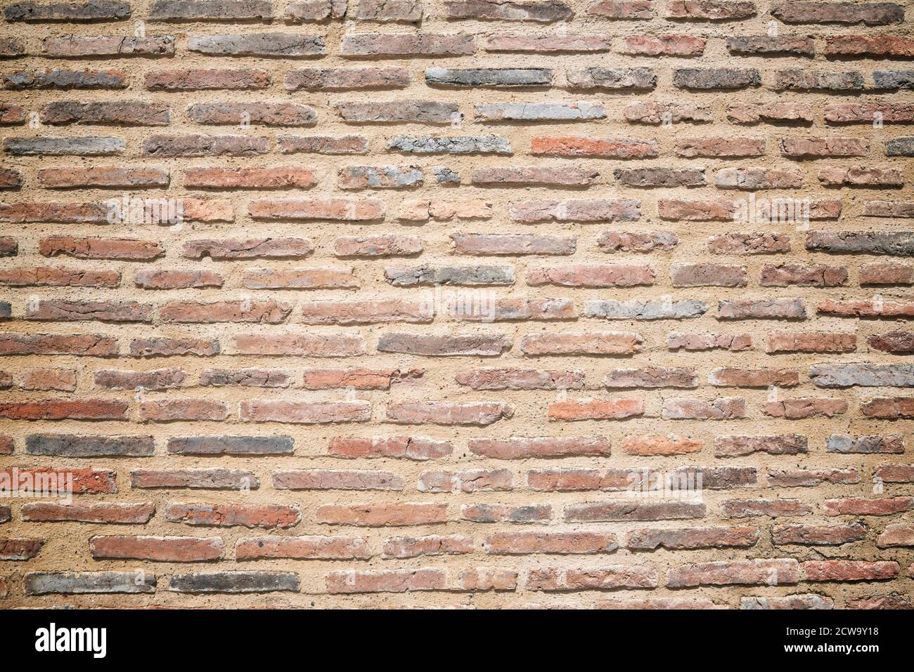 Front view of an old brick wall in France Stock Photo - Alamy