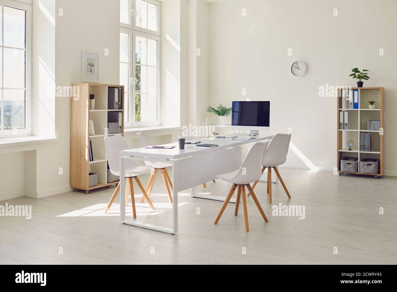 Interior of modern office room with big table, modern chairs and ...