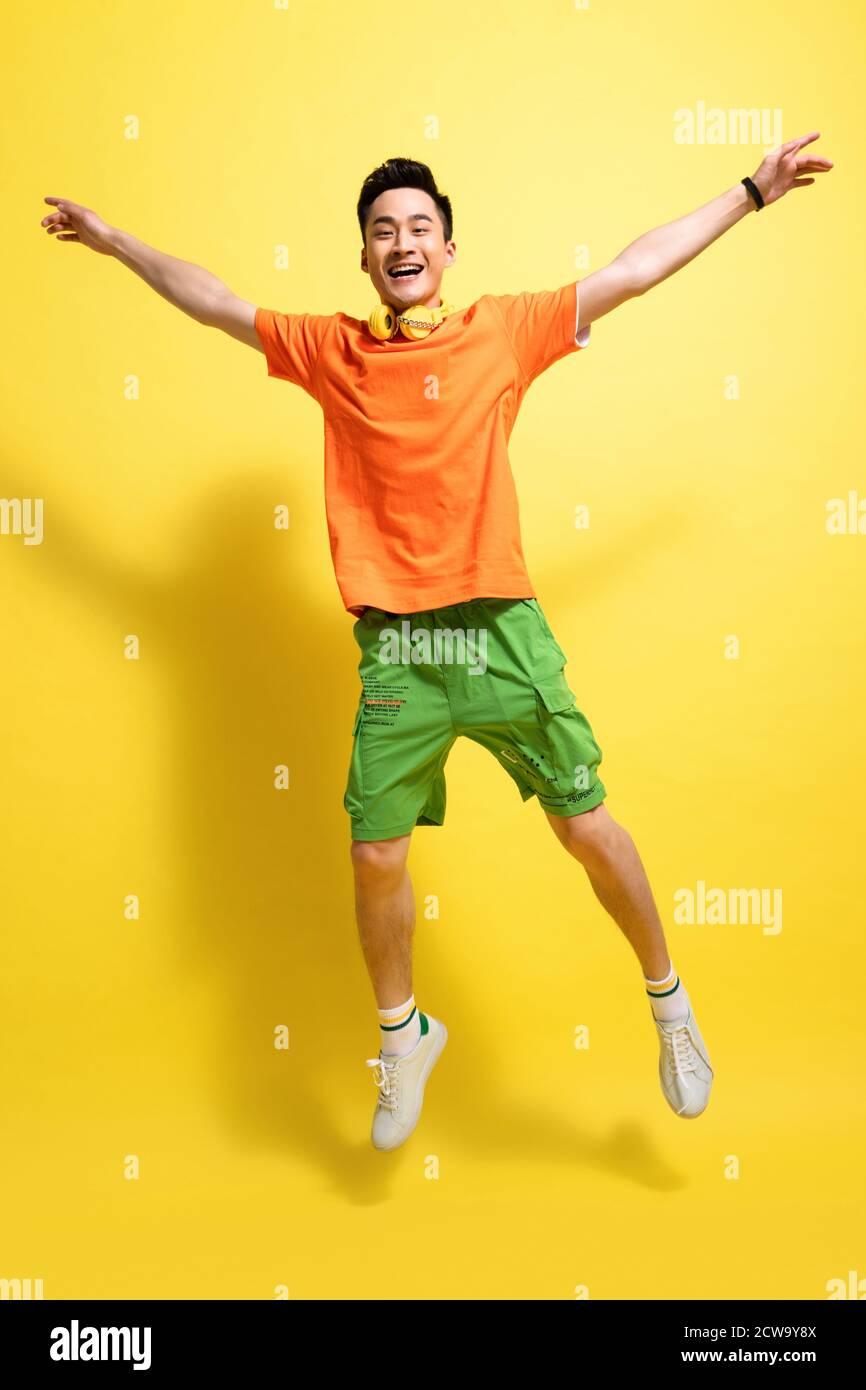 Energetic young man Stock Photo - Alamy