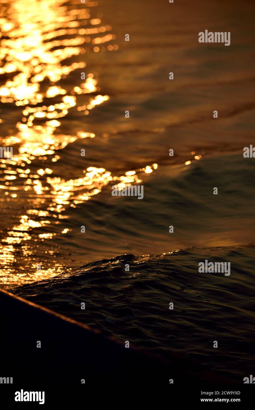 ocean water background while sunset in vertical Stock Photo - Alamy