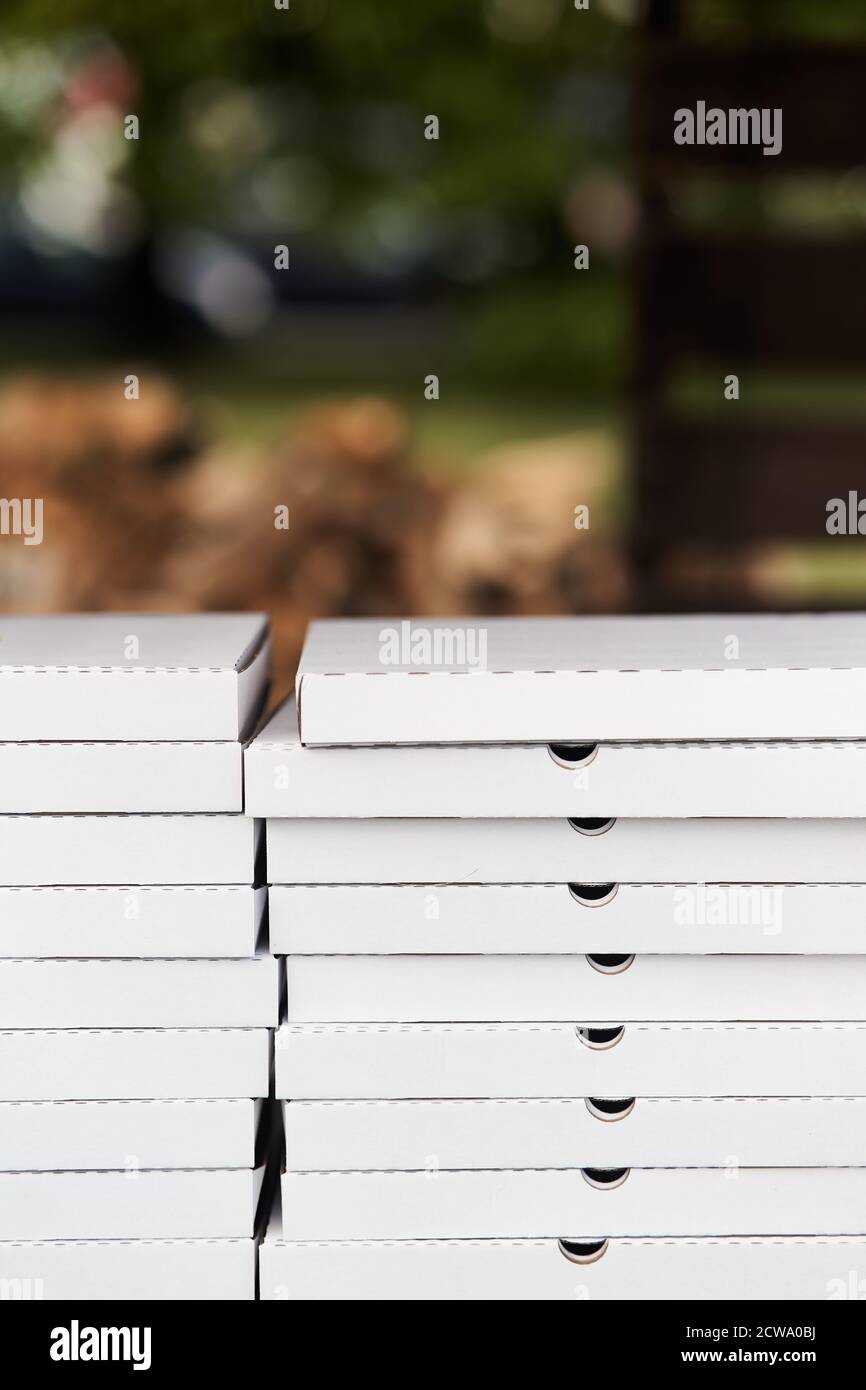 Stack of white cardboard pizza packages. Pizza packages close-up Stock ...