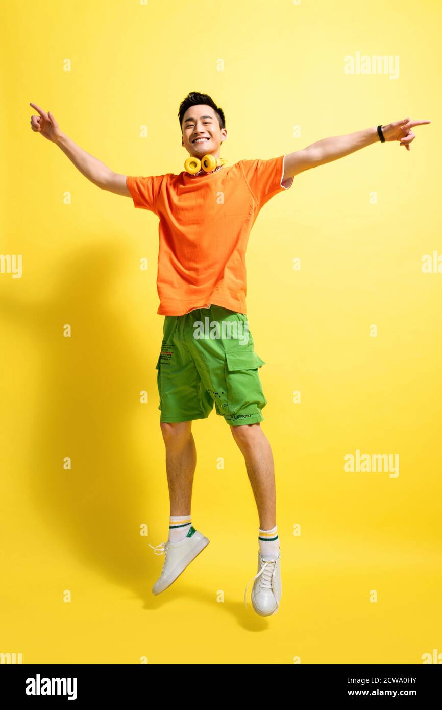 Energetic young man Stock Photo - Alamy
