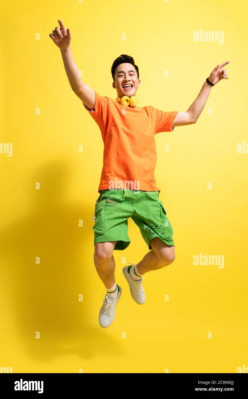 Energetic young man Stock Photo - Alamy