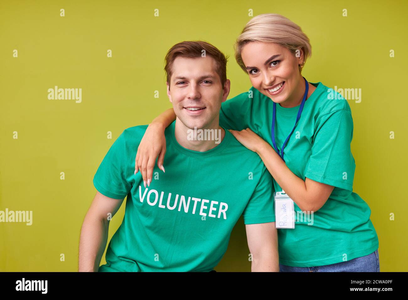 portrait of friendly charity team volunteering together, young ...