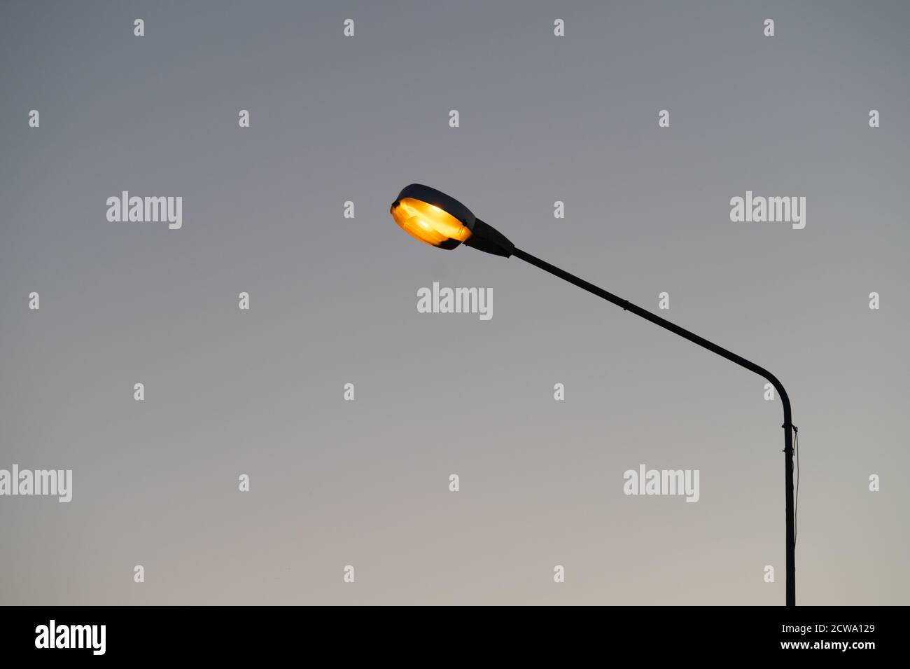 Street light against twilight background Stock Photo - Alamy