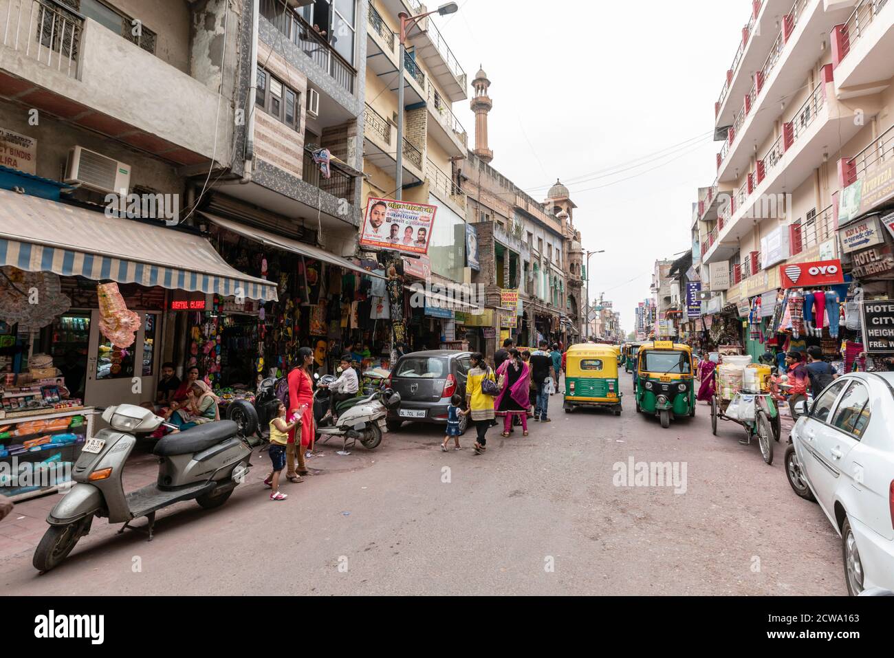 Crowded shops and traffic on Main Bazar in New Delhi, India Stock Photo ...