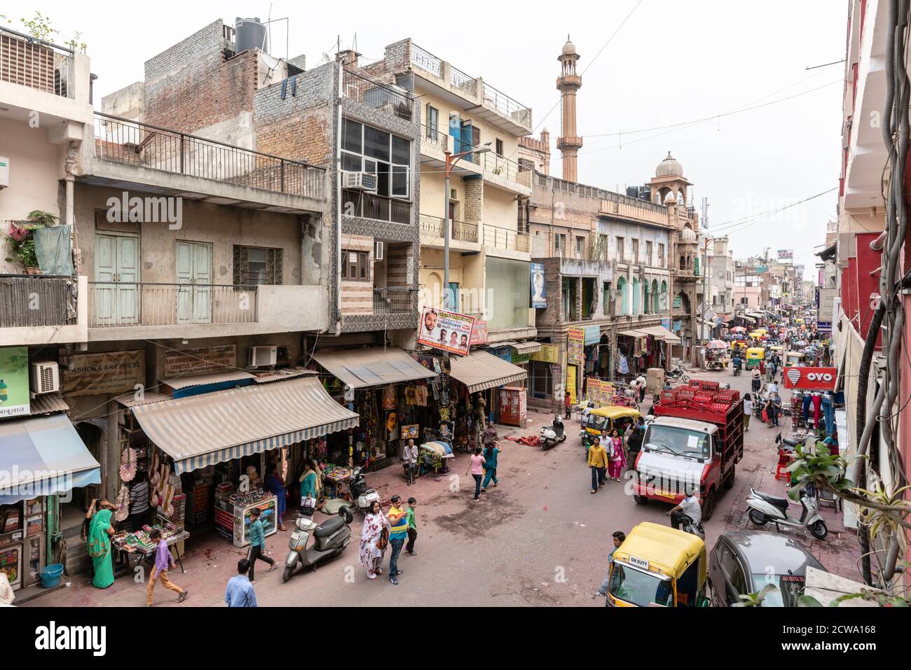 Crowded shops and traffic on Main Bazar in New Delhi, India Stock Photo ...