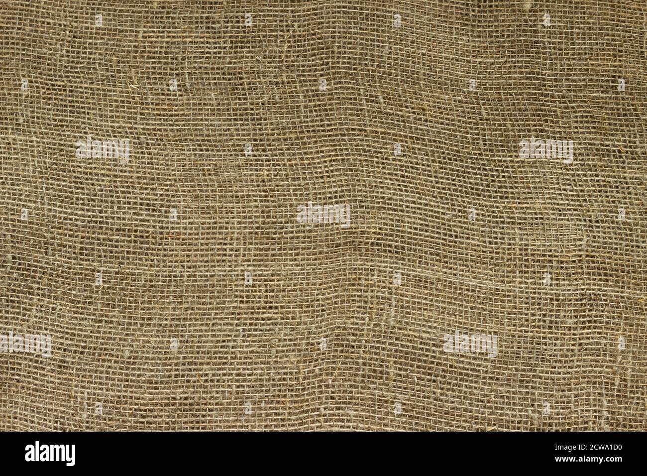 The structure of the threads of a natural burlap fabric close up Stock ...