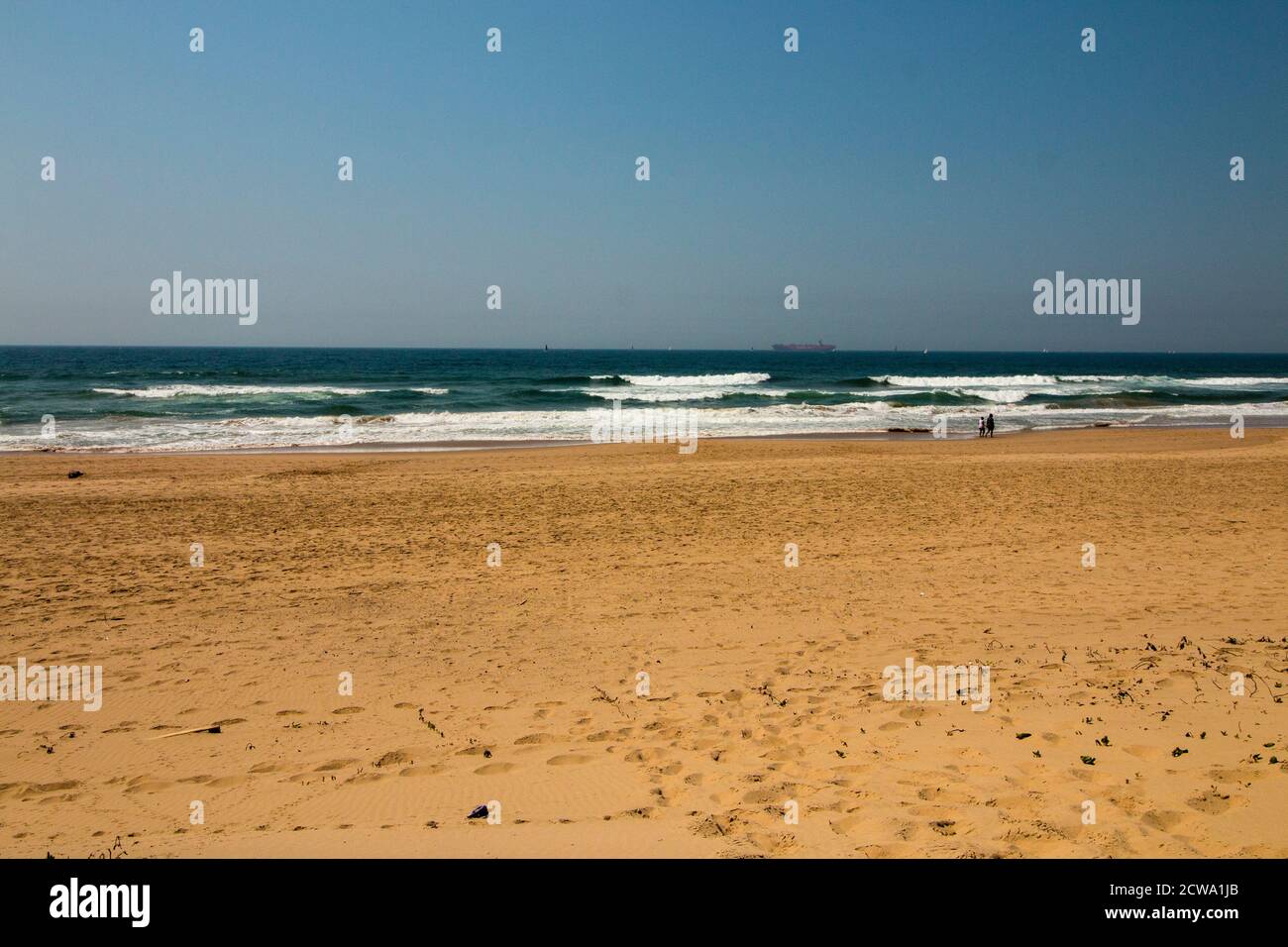 Stretch of beach sand and deep blue sea, Durban South Africa Stock ...