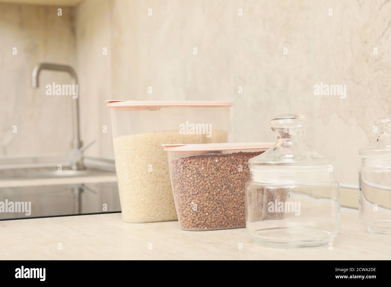 Modern kitchen interior with plastic containers with cereals Stock ...