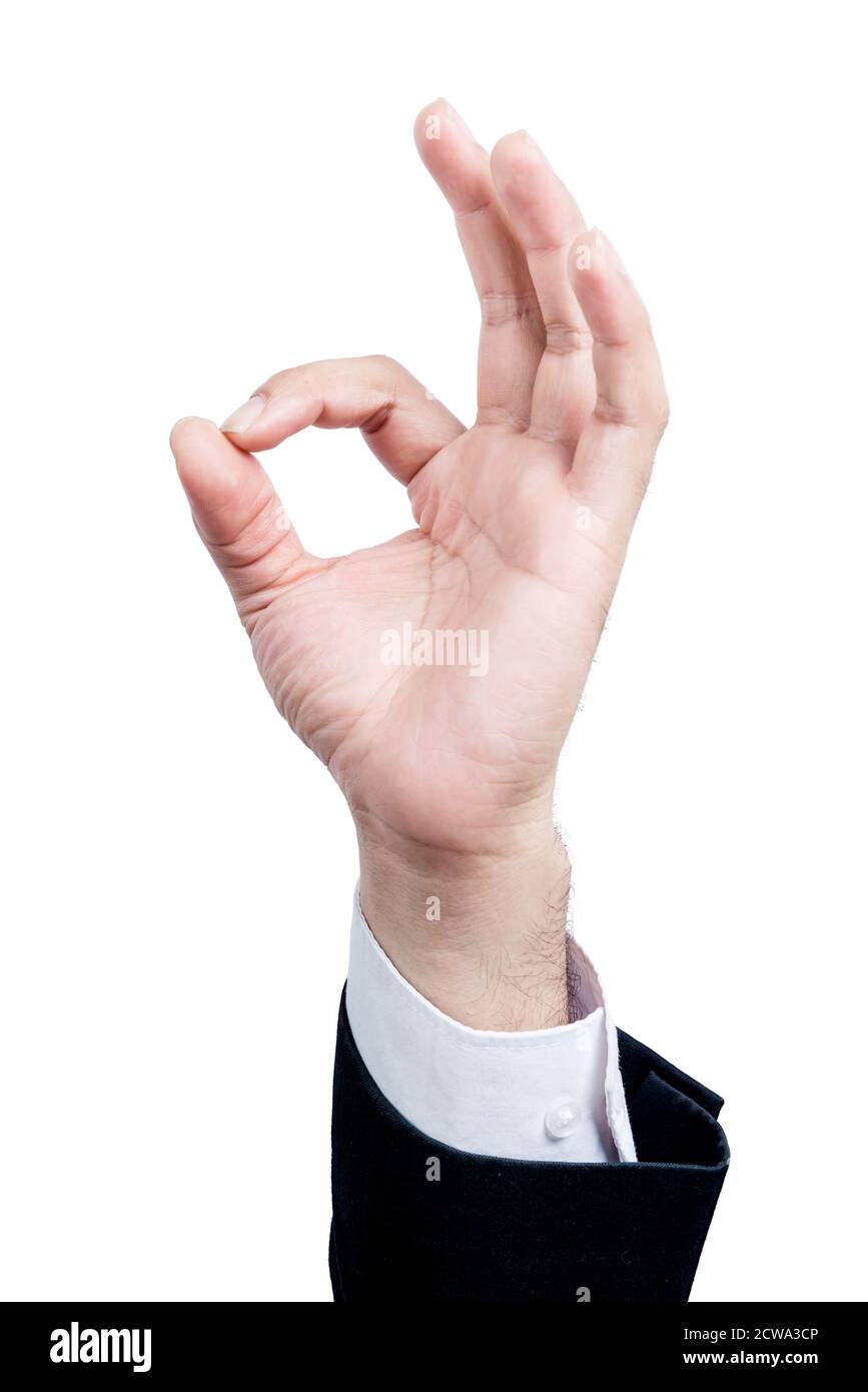 Businessman showing an ok sign with his hand isolated over white ...