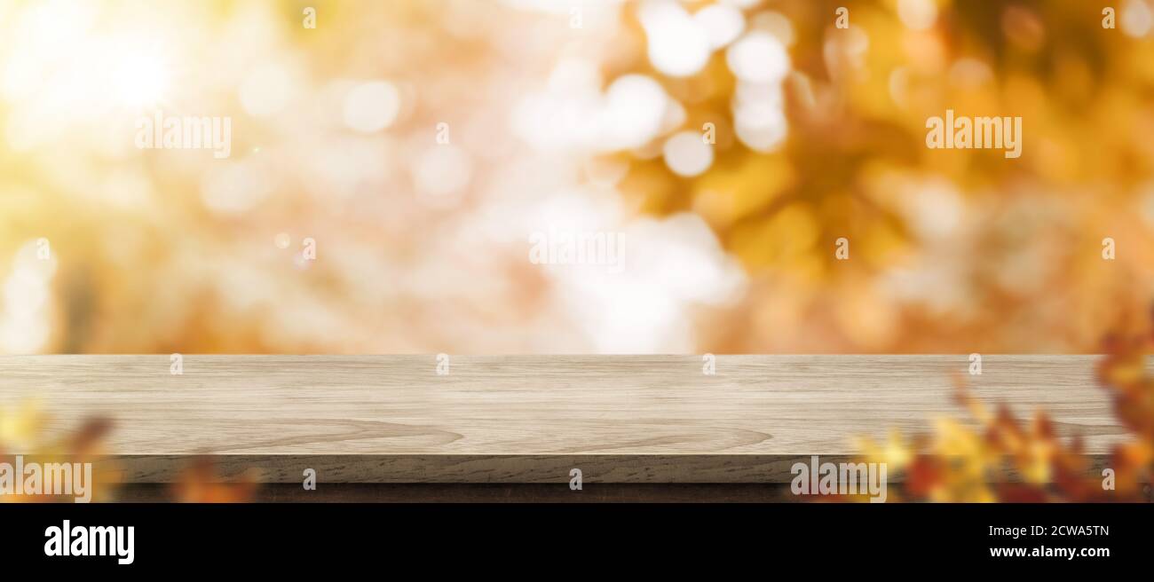 Autumn background.Empty old rustic wood table with blur forest tree ...