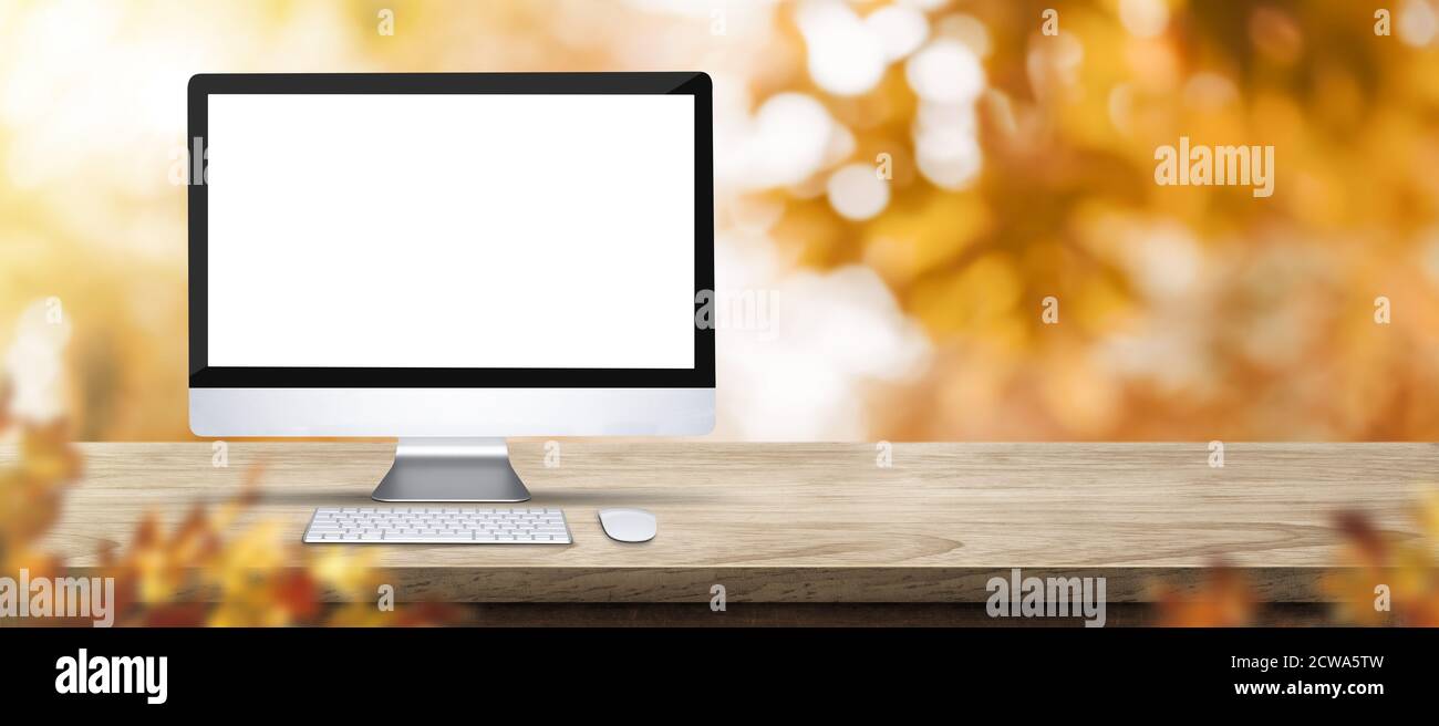 Autumn background.Blank desktop computer on rustic wood table with blur ...