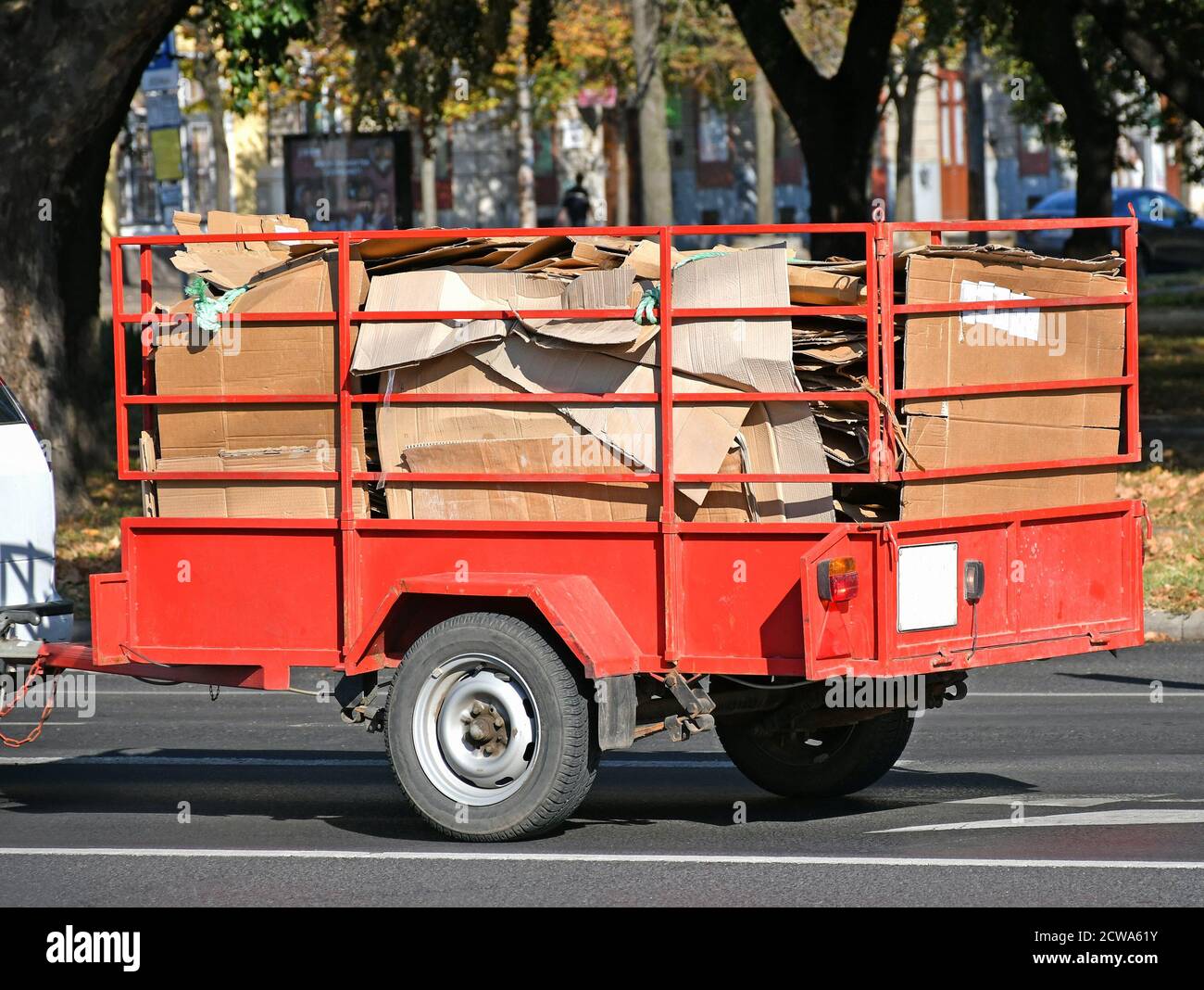 Small trailer full of paper boxes Stock Photo - Alamy