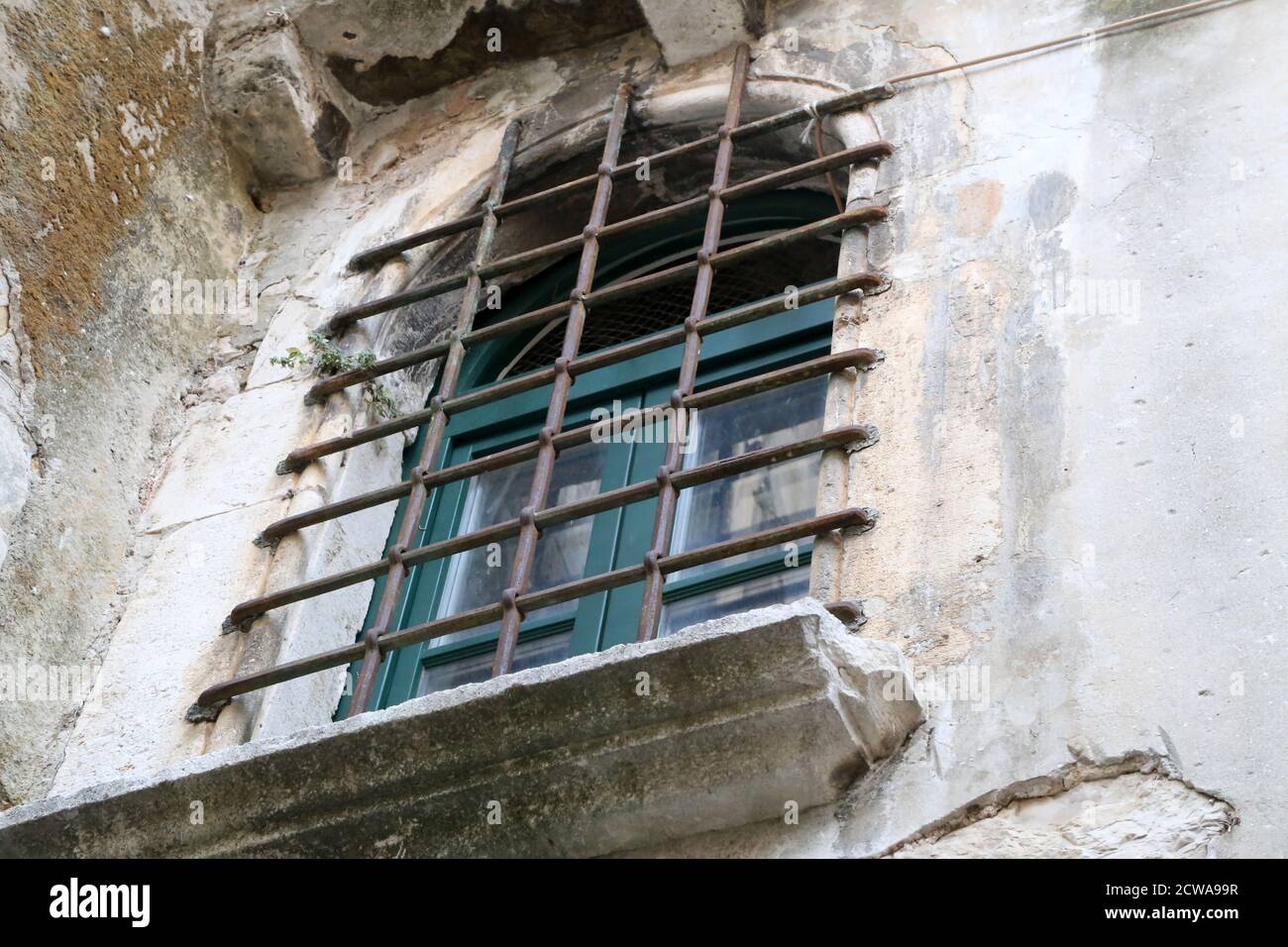 Windows metal grilles view hi-res stock photography and images - Alamy