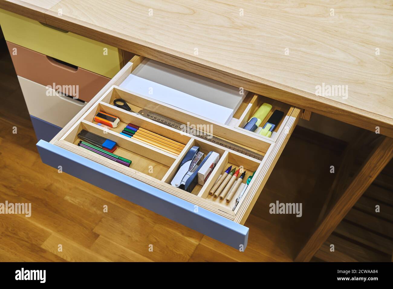 Ready for school. Open desk drawer with various school supplies ...