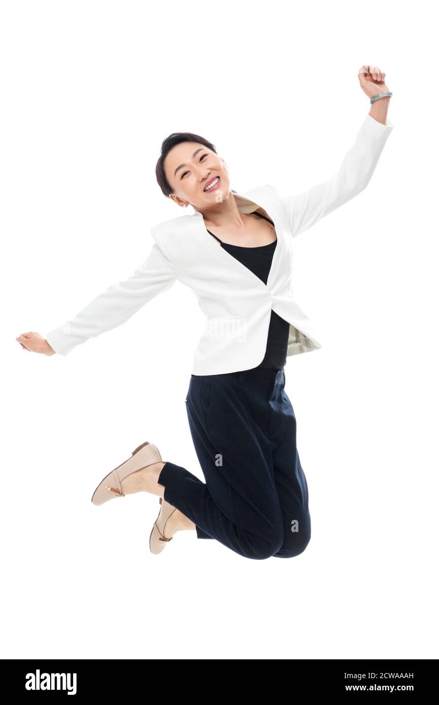 Excited jumping business lady Stock Photo - Alamy