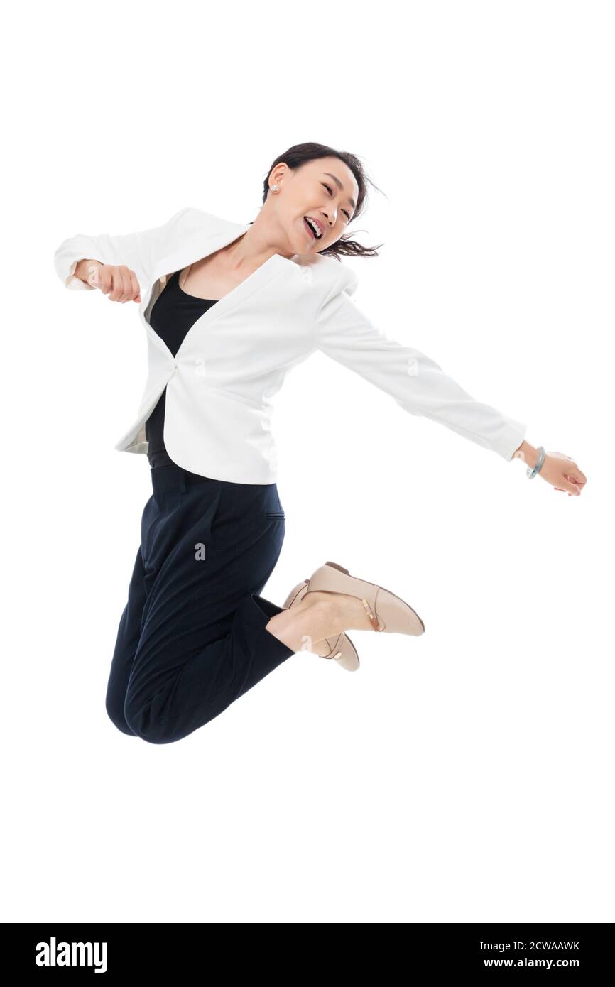 Excited jumping business lady Stock Photo - Alamy
