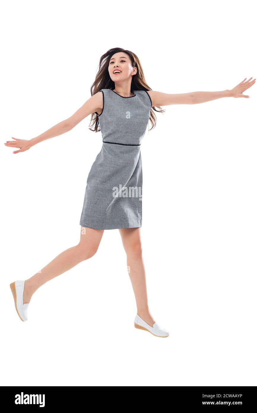 Running jump business lady Stock Photo - Alamy