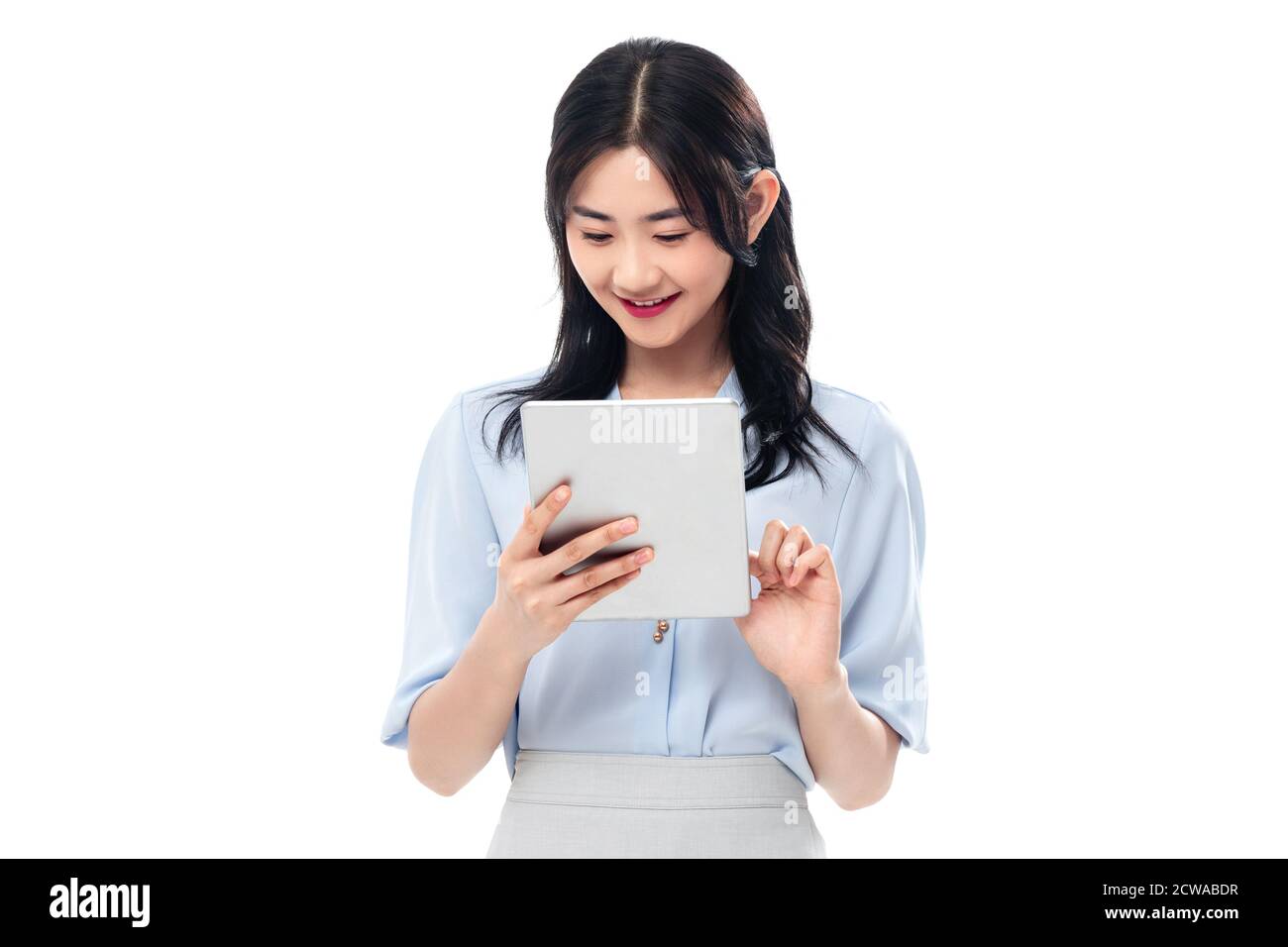 Using the tablet business lady Stock Photo - Alamy