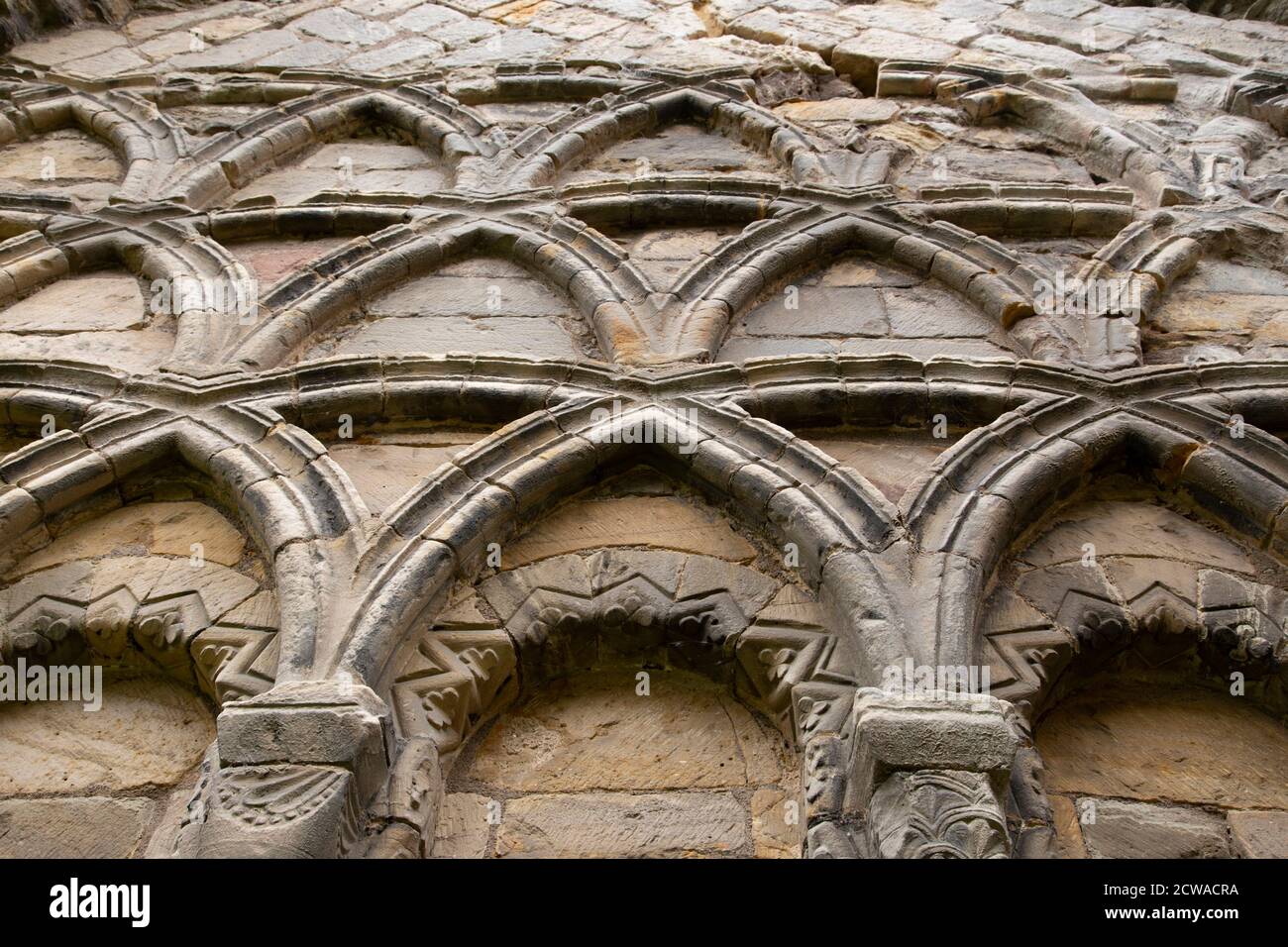 Stone carving on a wall of a medieval priory abbey Stock Photo - Alamy